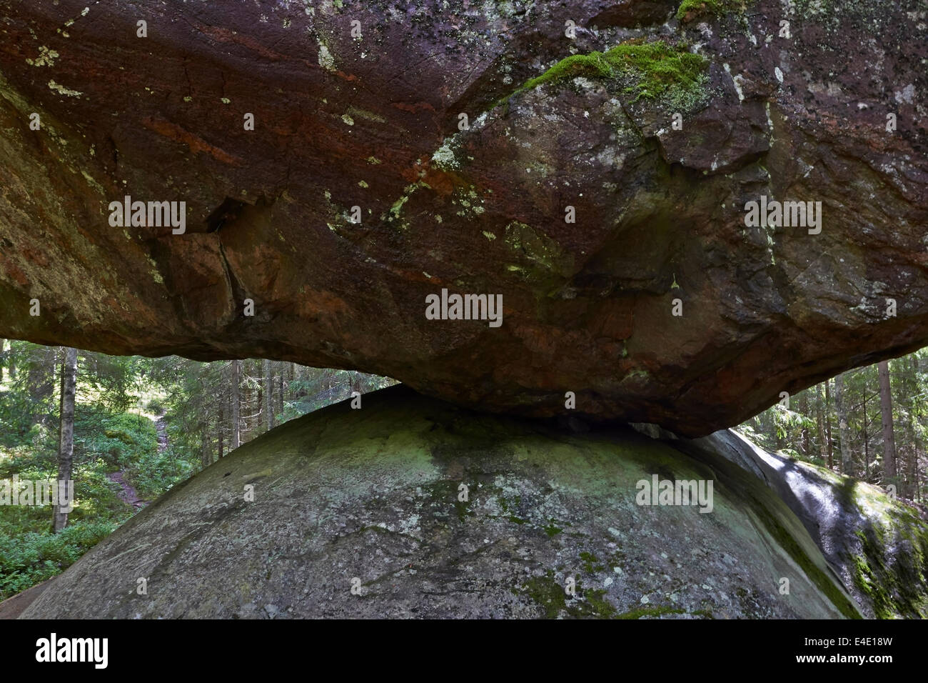 Kummakivi, balancing boulder on bedrock in Ruokolahti Finland Stock ...
