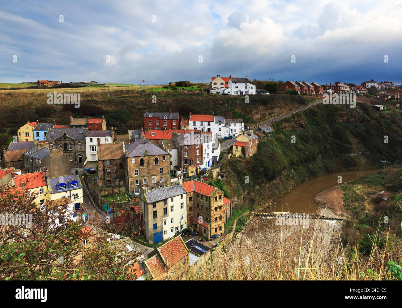 The fishing village of Staithes, North Yorkshire, looking east across ...