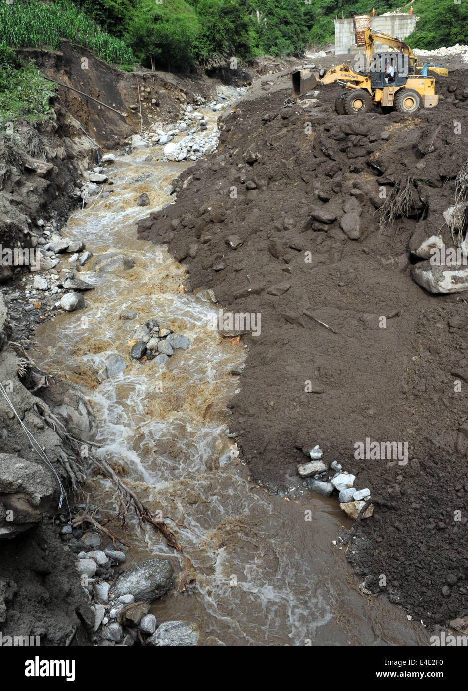 Nujiang, China's Yunnan Province. 9th July, 2014. Rescuers work on the ...