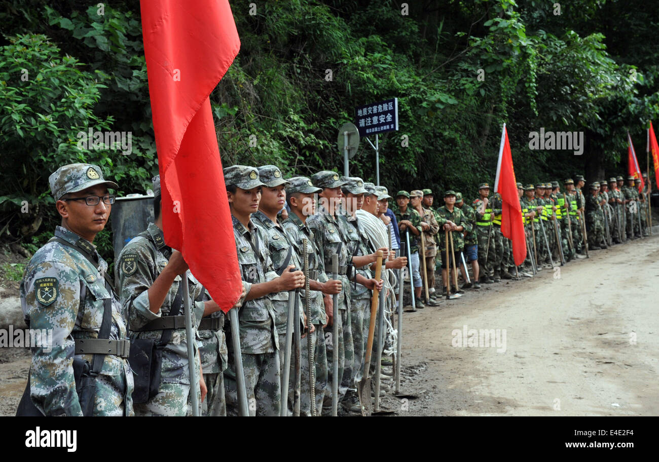 Nujiang, China's Yunnan Province. 9th July, 2014. Rescuers prepare to ...
