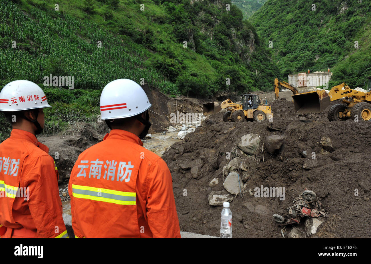 Nujiang, China's Yunnan Province. 9th July, 2014. Rescuers work on the ...