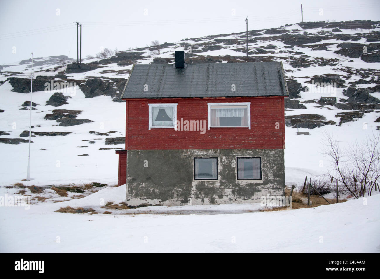 Red house in winterlandscape Stock Photo - Alamy