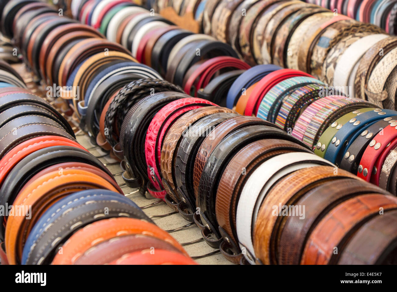 Set of different and colorful leather belts as a background Stock Photo ...
