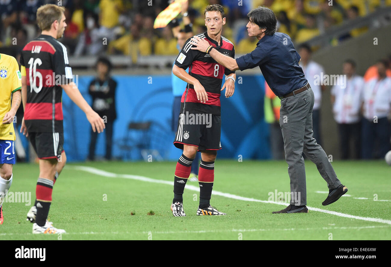Belo Horizonte, Brazil. 08th July, 2014. Germany's Mesut Oezil chats ...