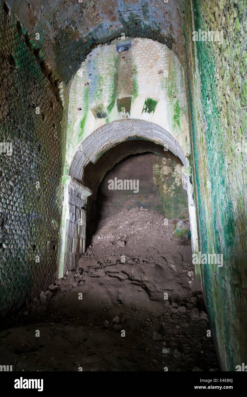 Collapsed passageway under the seating tiers of the Roman amphitheatre ...