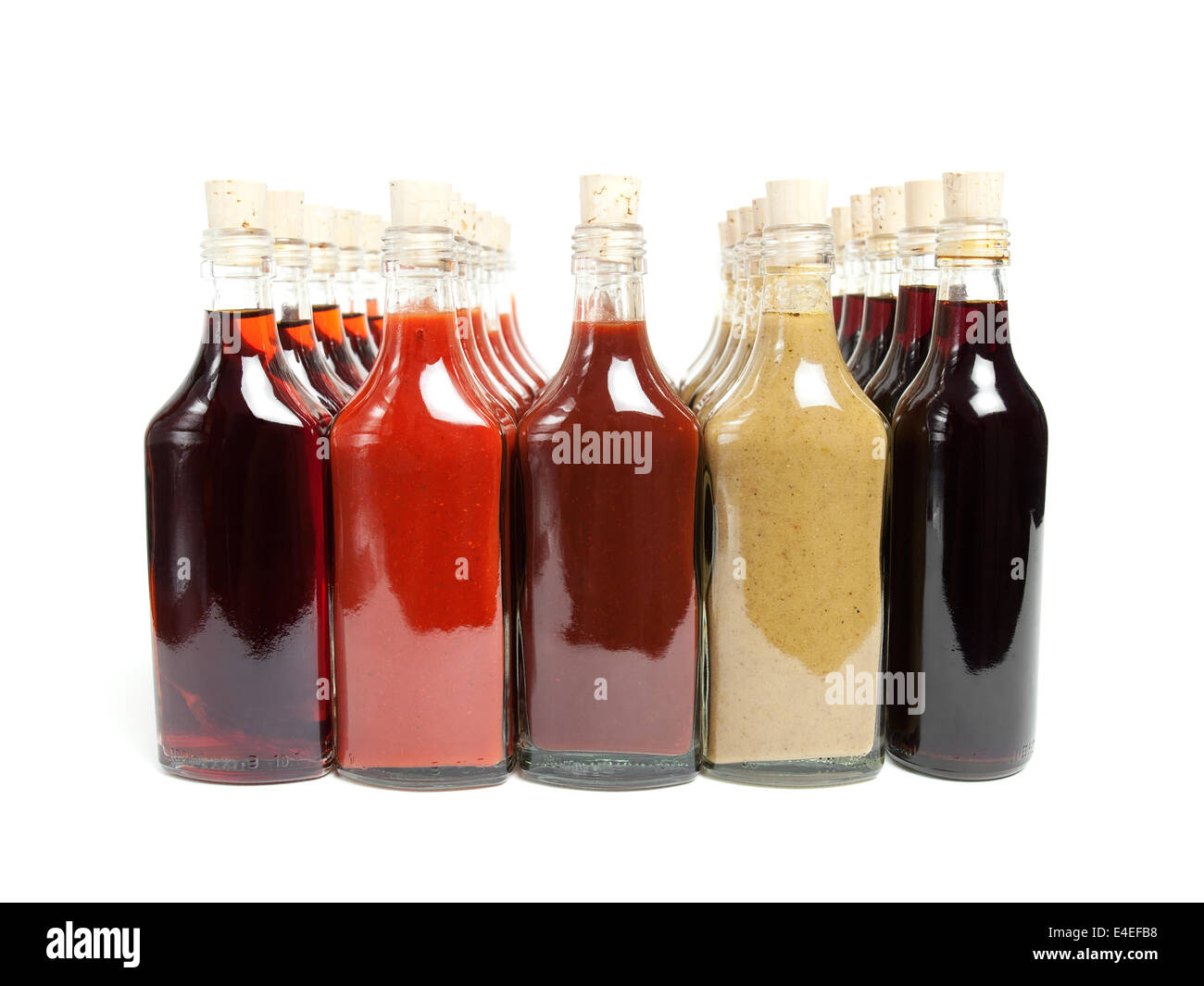 Hot sauce bottle on white Cut Out Stock Images & Pictures - Alamy