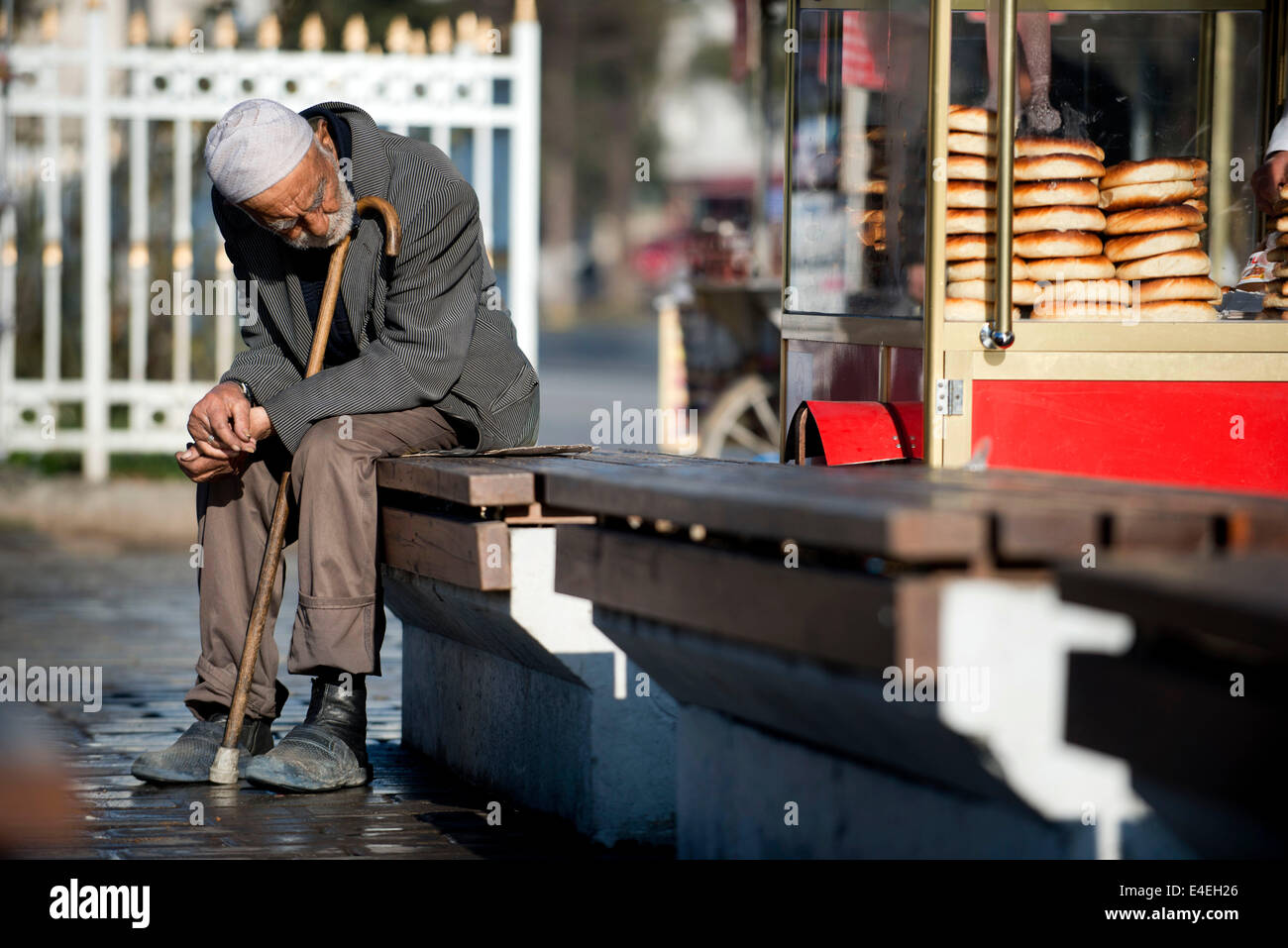 Old man next to a street-food vendor, near the Blue Mosque in Istanbul ...