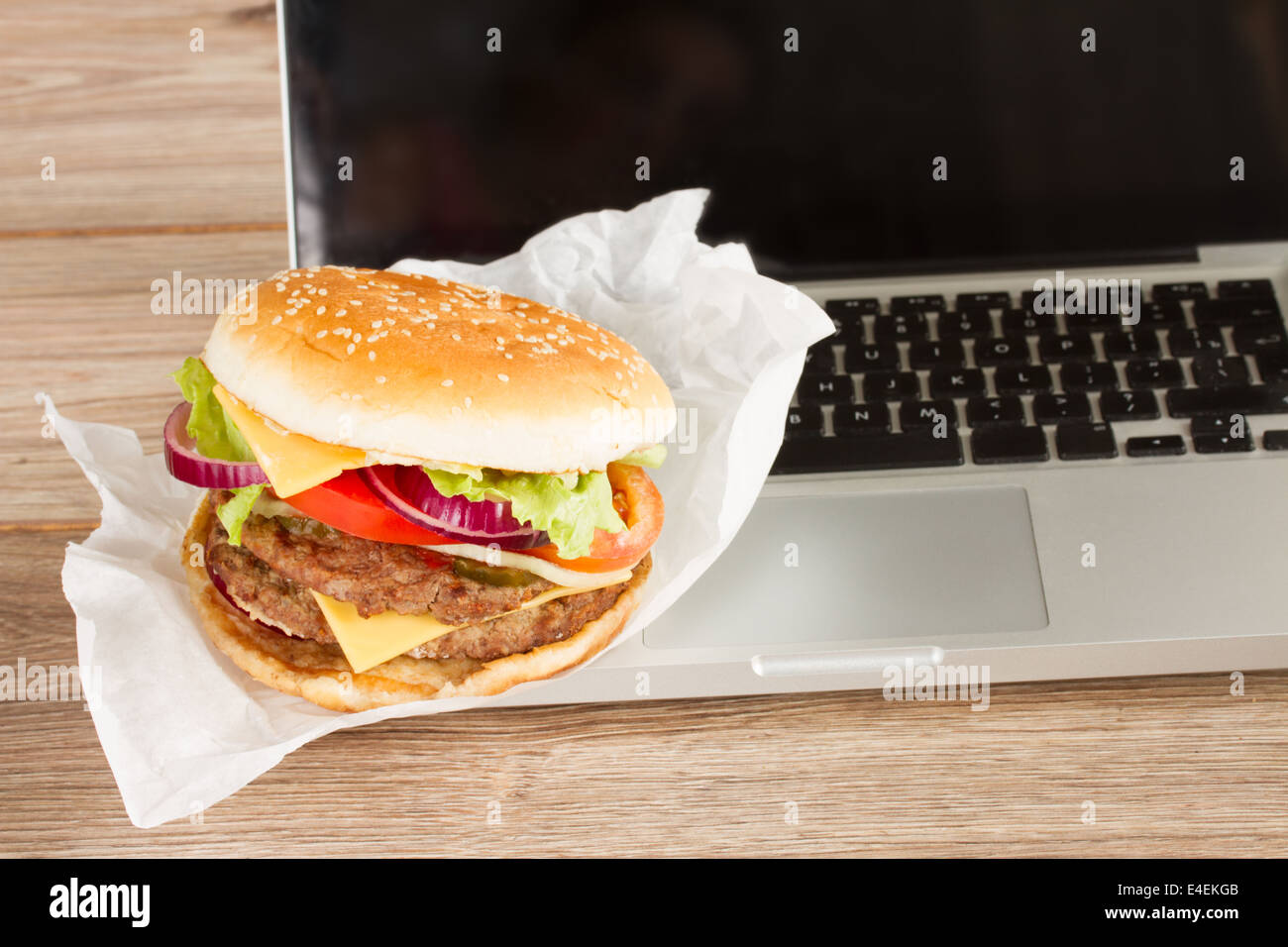 Office desk computer burger coffee hi-res stock photography and images ...