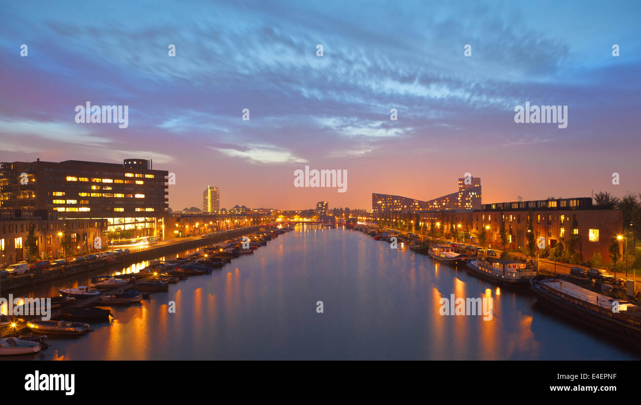 Waterfront canal near the Python bridge in Amsterdam -night landscape ...