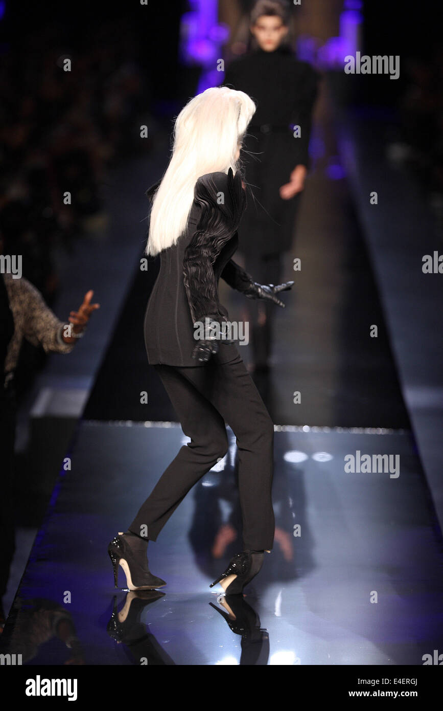 Paris, France. 9th July, 2014. Swiss model Catherine Loewe tumbles ...