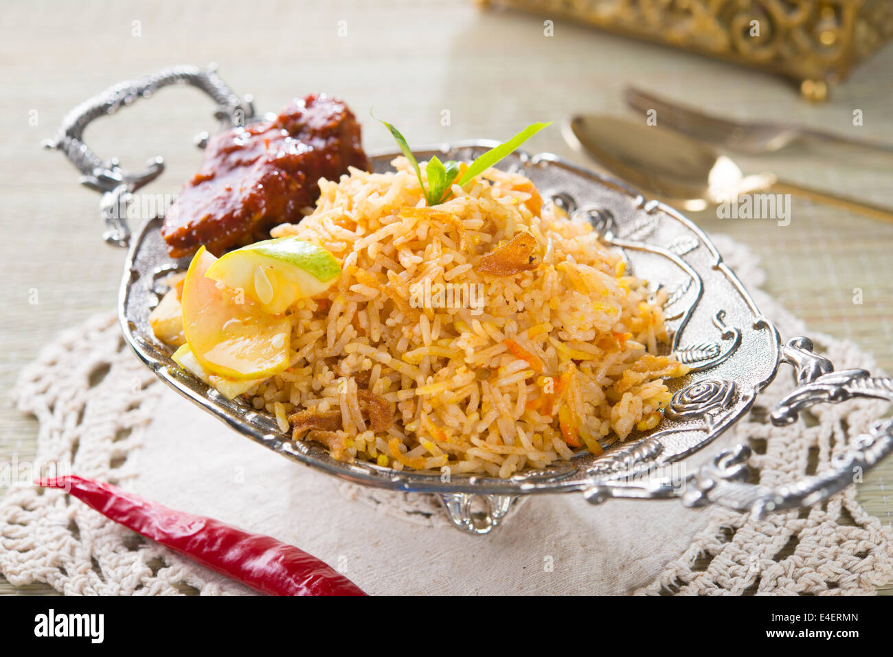 chicken biryani with decorations Stock Photo - Alamy