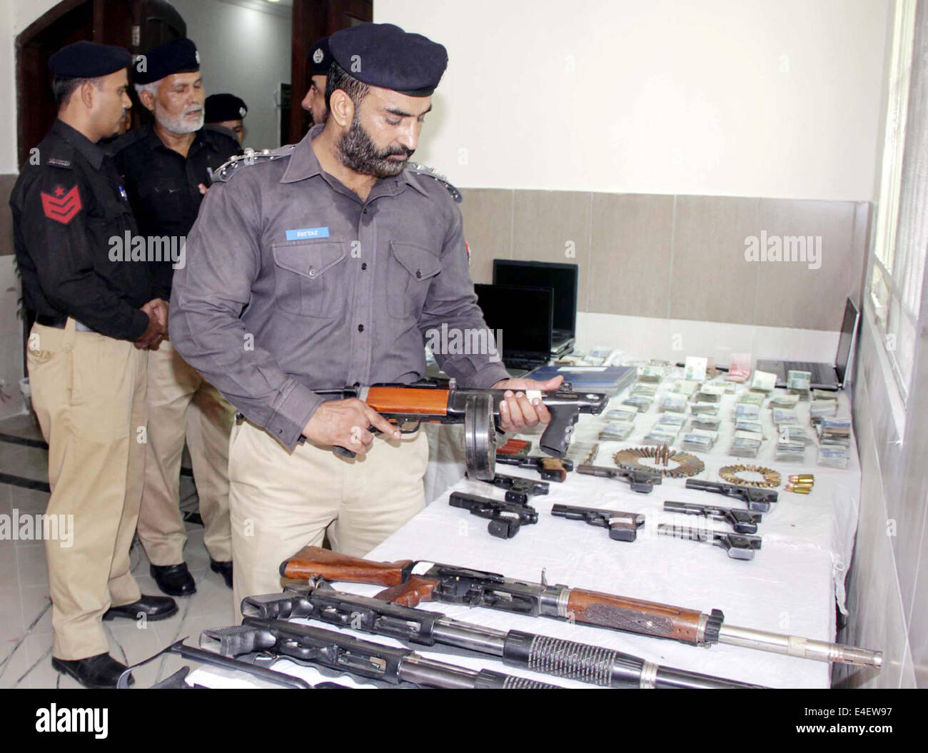 CIA Police officials are exposing robbed currency, weapons and exposing ...