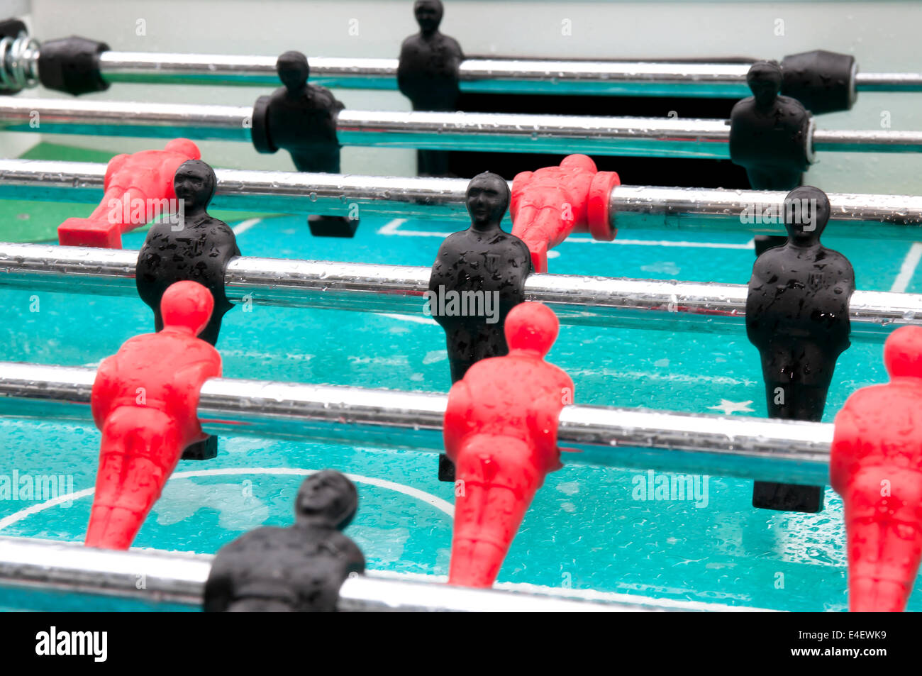 Table football playing hi-res stock photography and images - Alamy