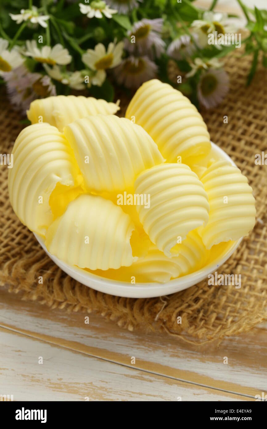 fresh yellow dairy butter in a white bowl Stock Photo - Alamy