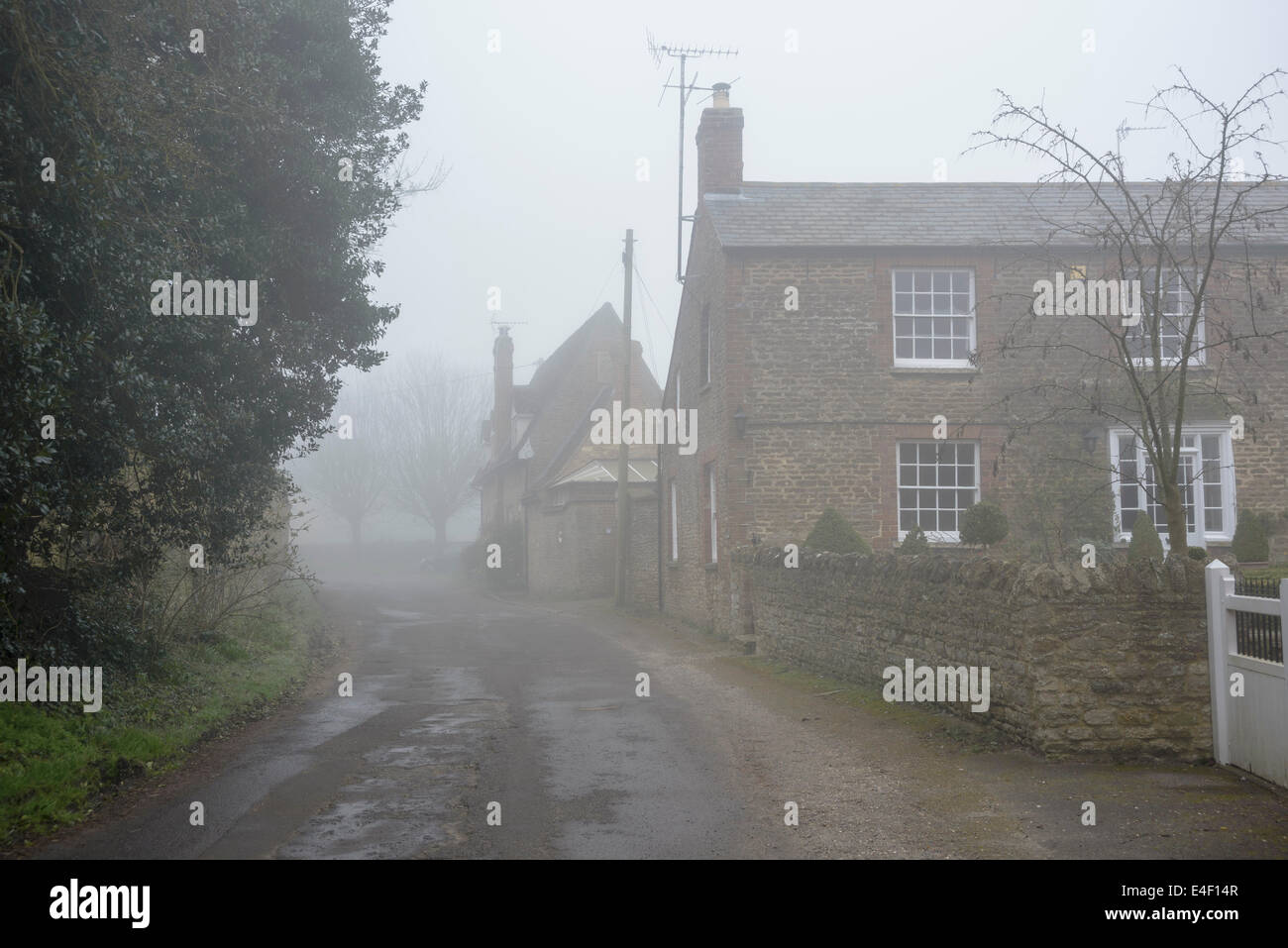 A foggy Spring morning in Longworth, Oxfordshire, England Stock Photo ...