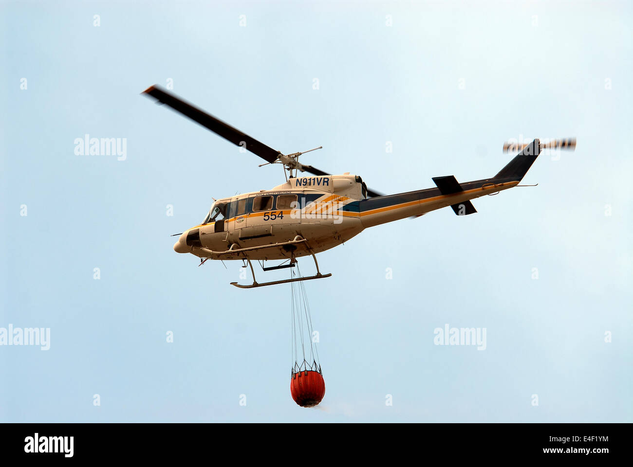 Side view helicopter hovering hi-res stock photography and images - Alamy