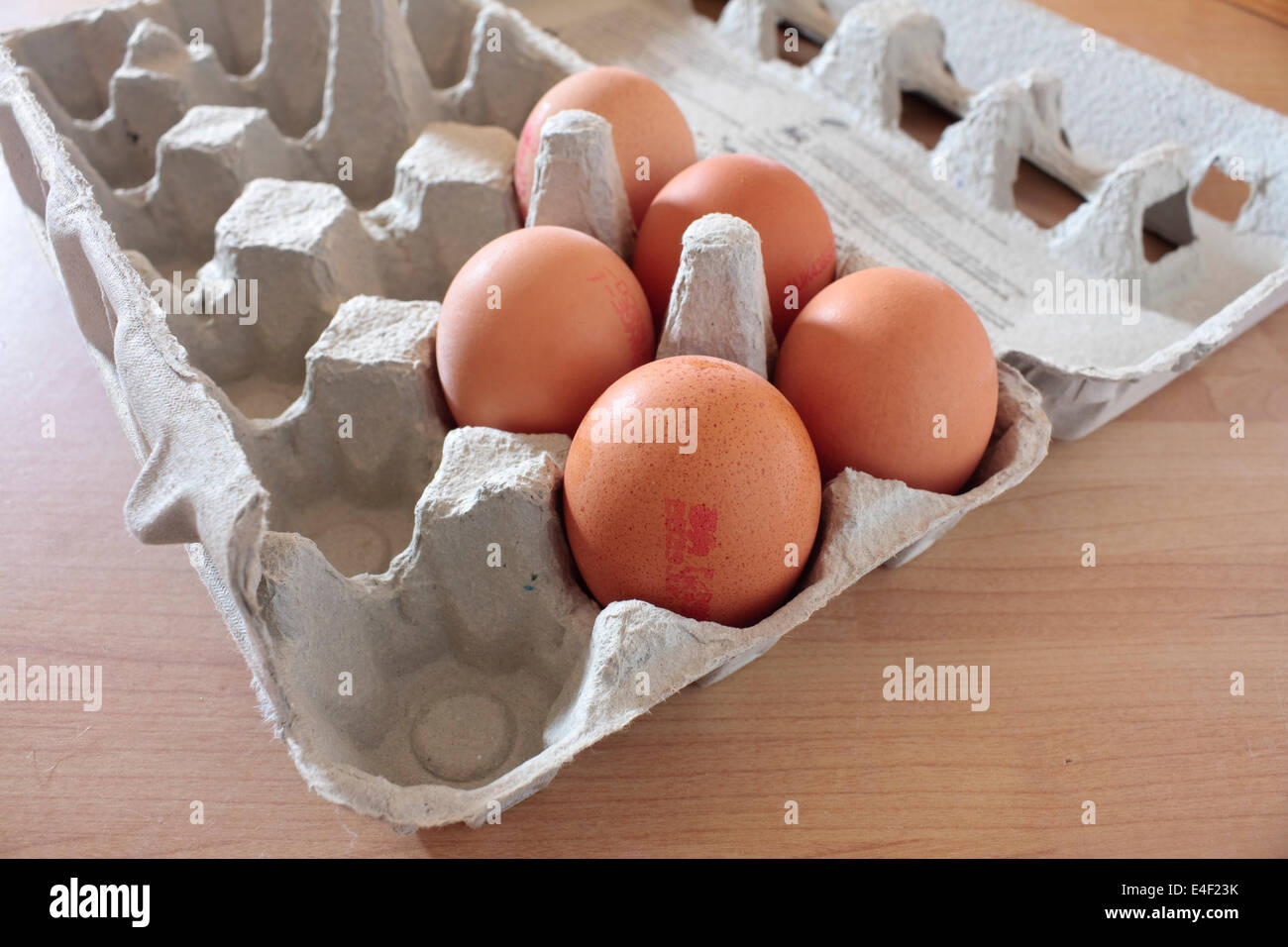 Five eggs in a large egg tray Stock Photo - Alamy