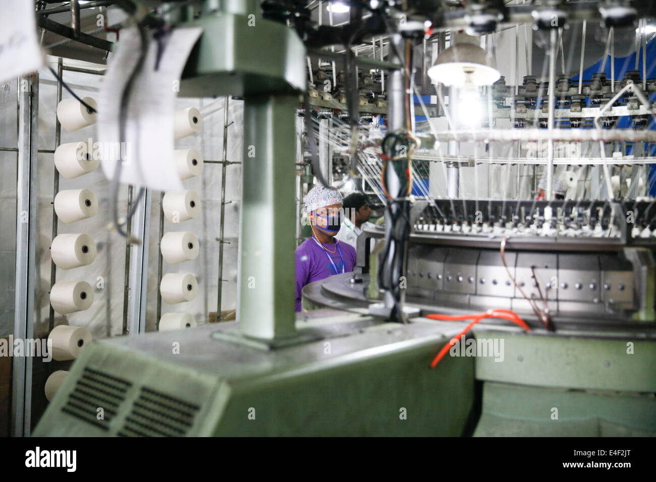 Dhaka, Bangladesh. 11th Feb, 2014. Knitting is the manufacturing stage which converts yarn into ...