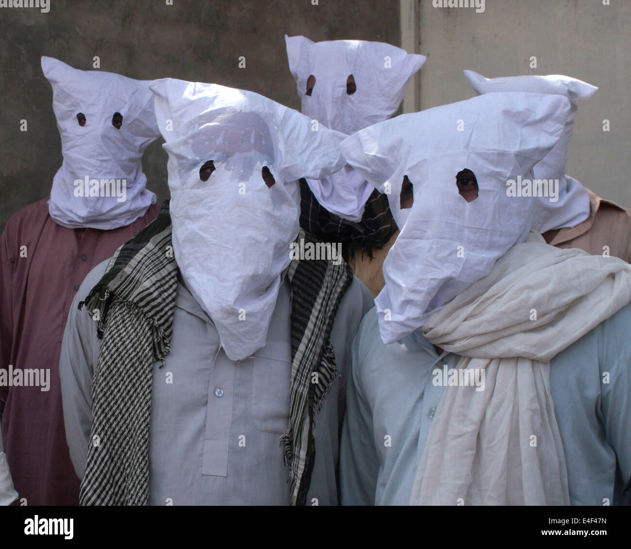 Lahore, Pakistan. 09th July, 2014. Pakistani Arrested suspects with ...