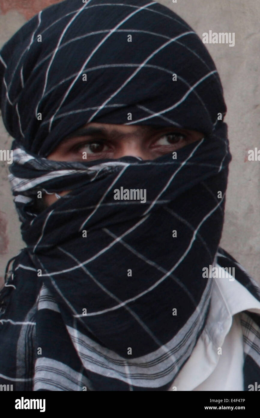 Lahore, Pakistan. 09th July, 2014. Pakistani Arrested suspects with ...