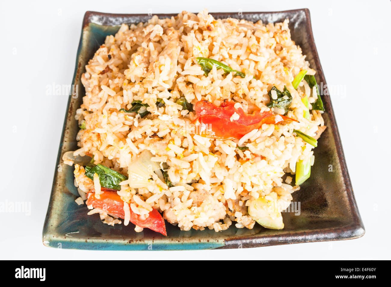Fried rice with deep fried pork garlic and vegetable Stock Photo - Alamy