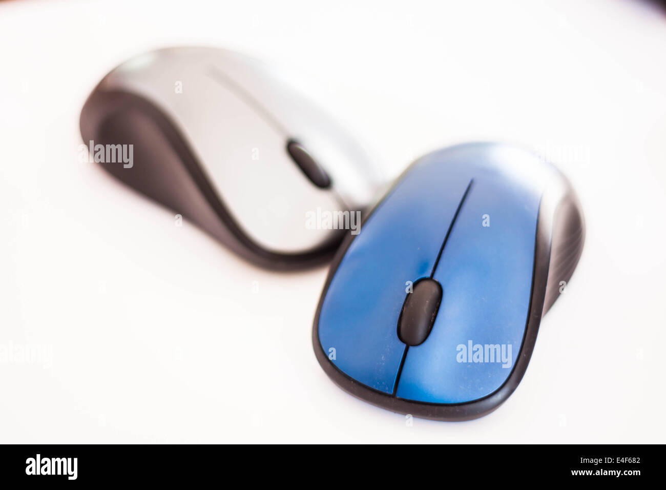 Blue and gray wireless mouse isolated on white background Stock Photo ...