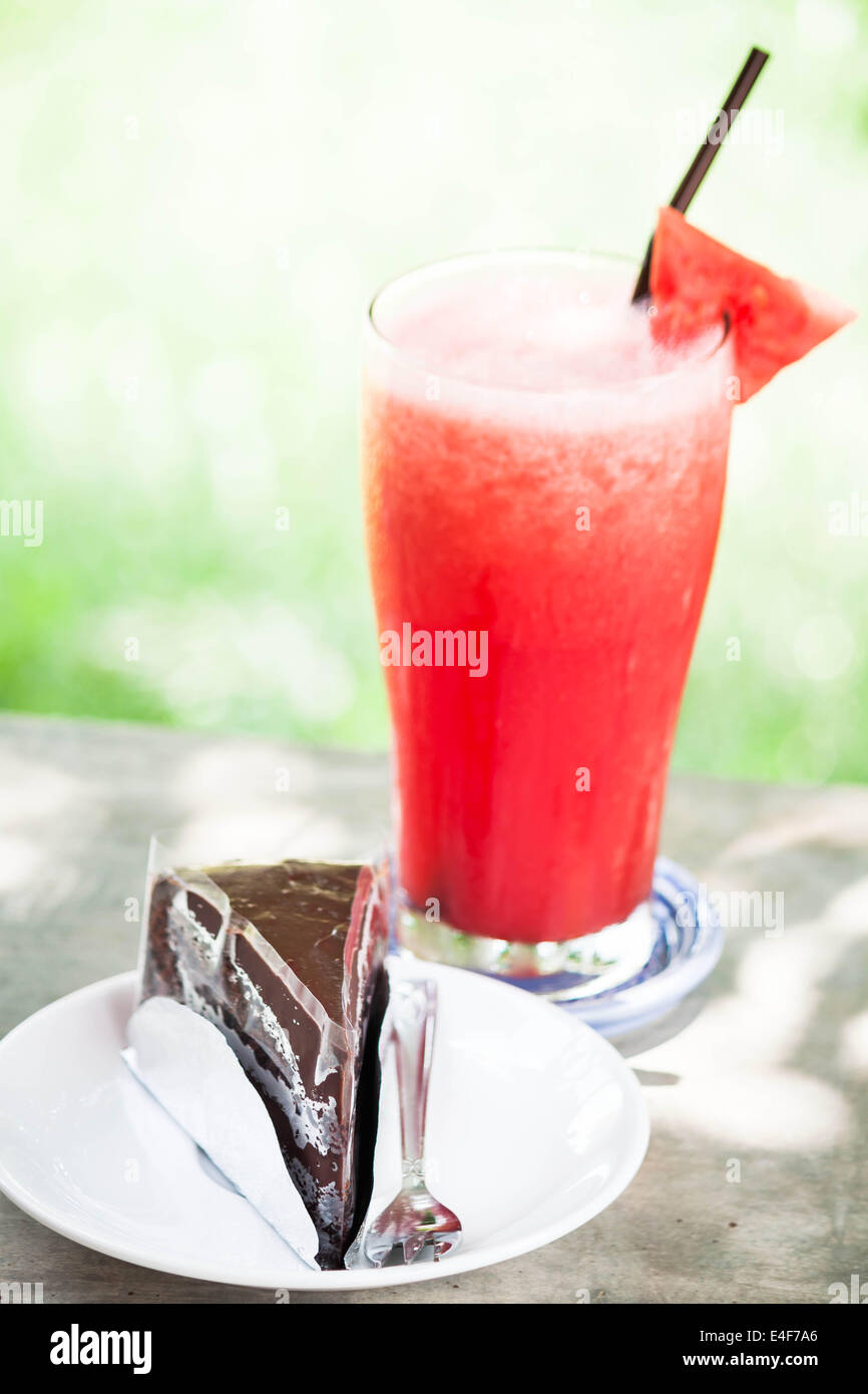 Water melon fruit juice frappe and chocolate cake Stock Photo - Alamy