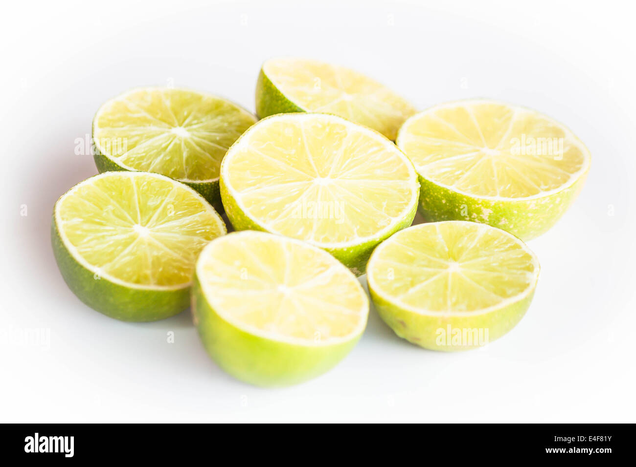 Fresh citrus lime half portion slice on white background Stock Photo ...