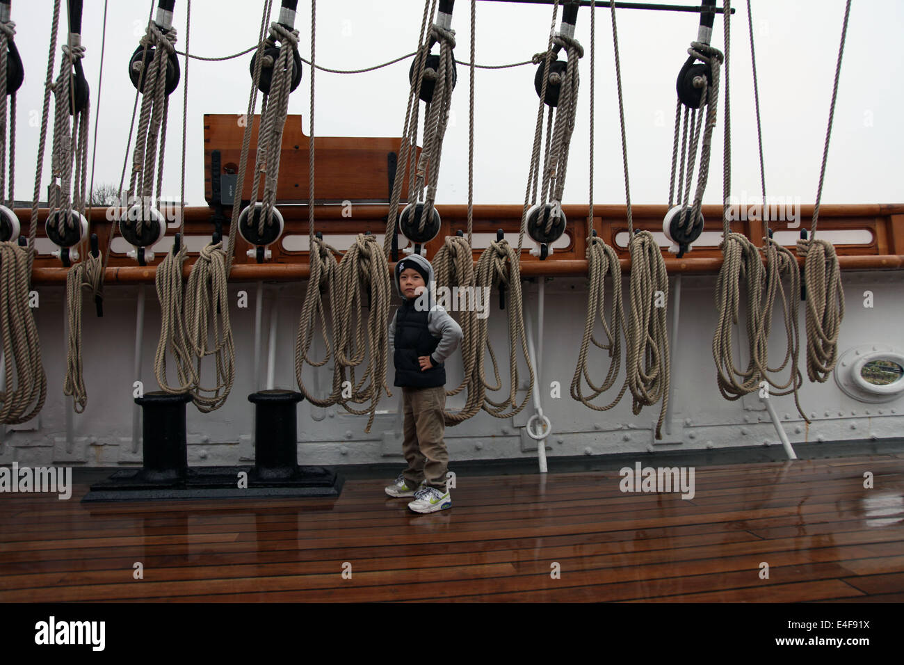 It's a photo of a young Eurasian Boy in the Cutty Sark Boat in England ...
