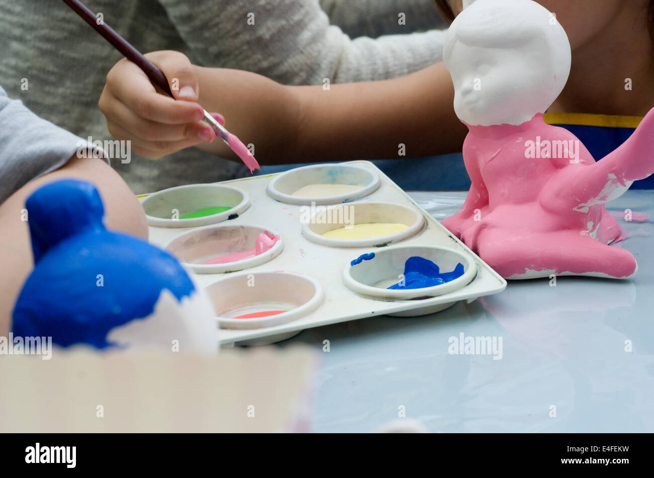 Young children painting art class Stock Photo - Alamy
