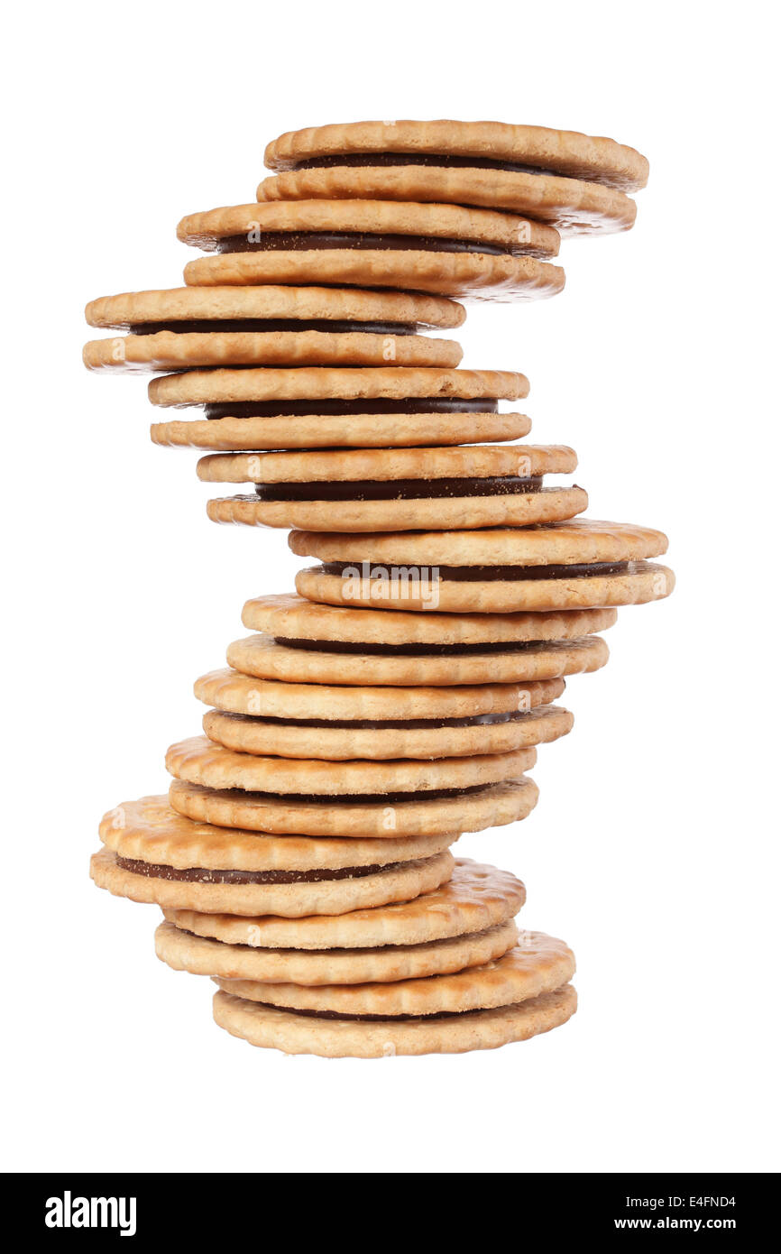 Stack of balanced biscuit. Isolated on white background Stock Photo - Alamy