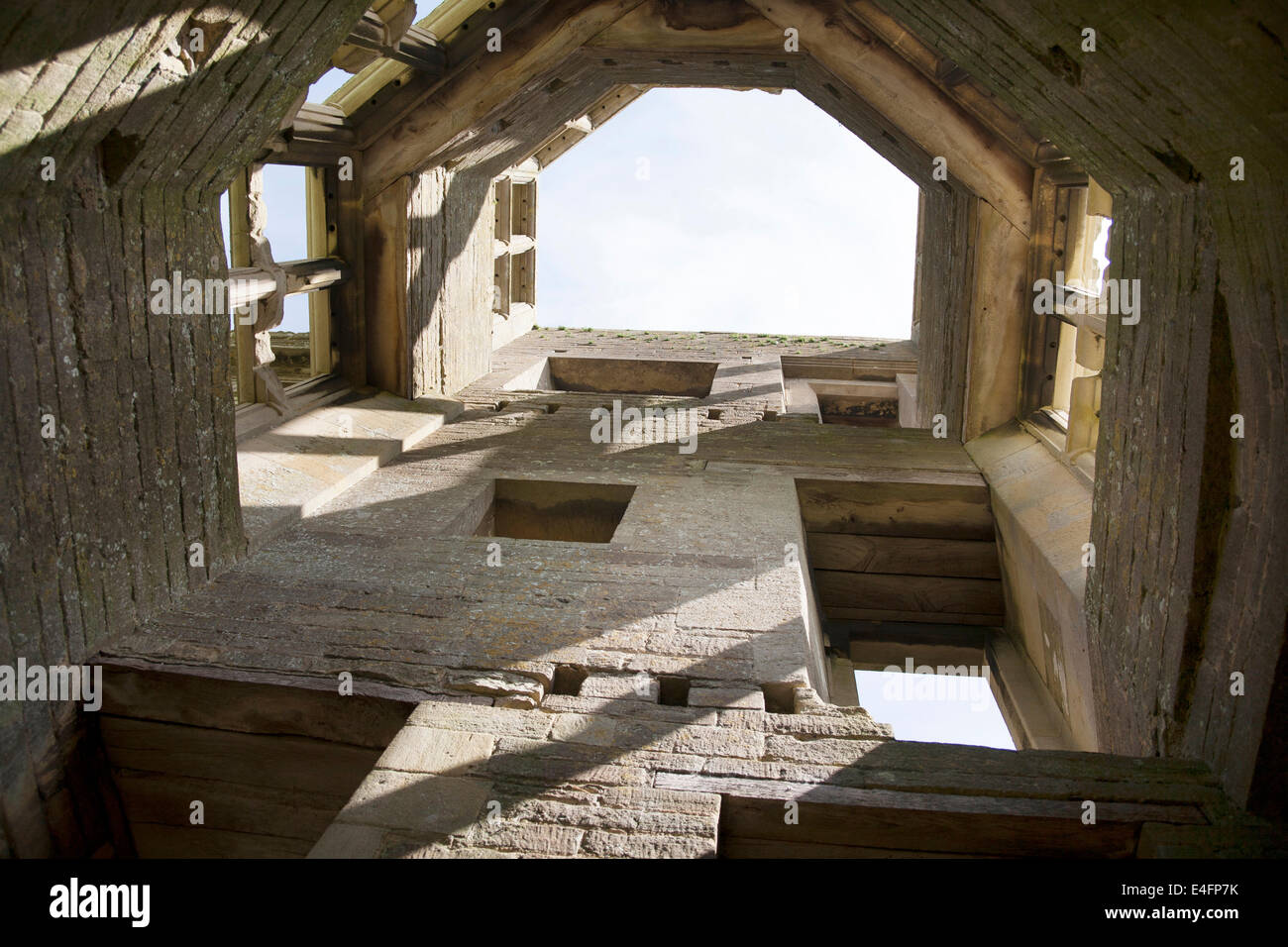 Ruin of old part built National Trust stately home at Lyveden New Bield ...