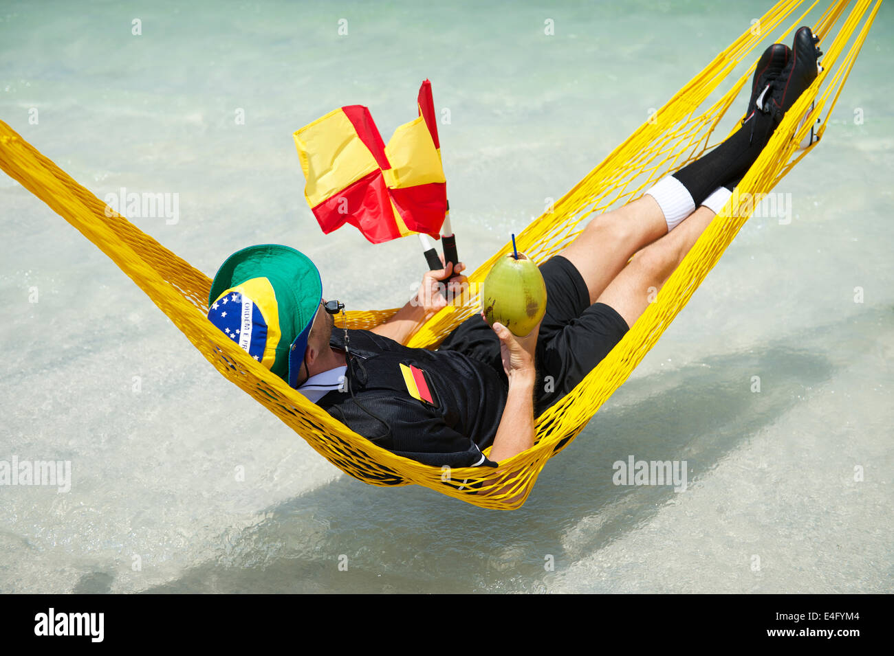 Soccer football referee taking a break from the World Cup to relax at ...