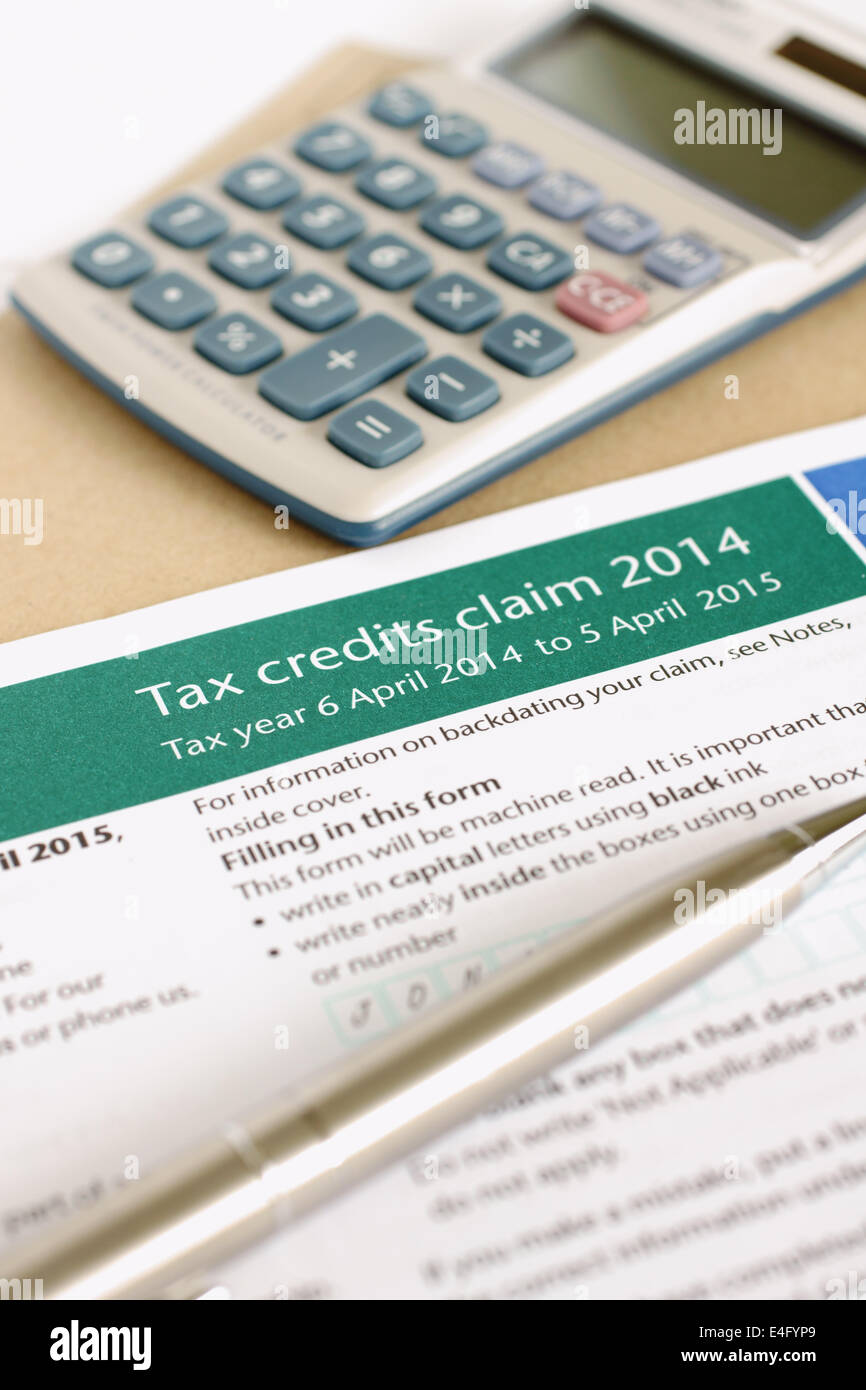 Completing a British working tax credit application concept Stock Photo ...