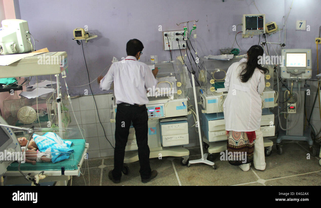 Lahore, Pakistan. 10th July, 2014. Pakistani new born babies being ...
