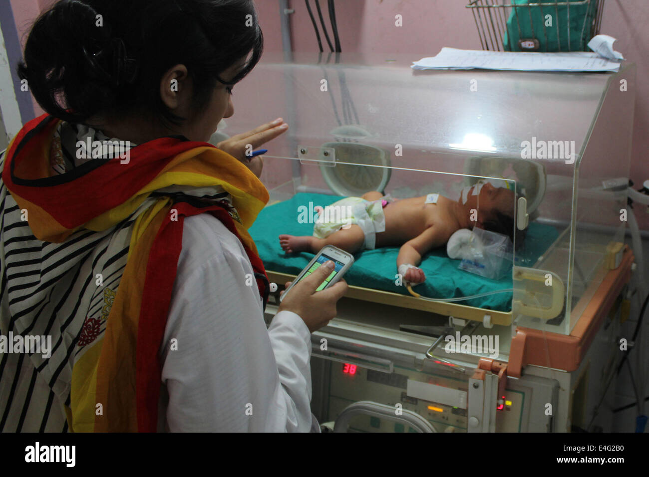 Lahore, Pakistan. 10th July, 2014. Pakistani new born babies being ...