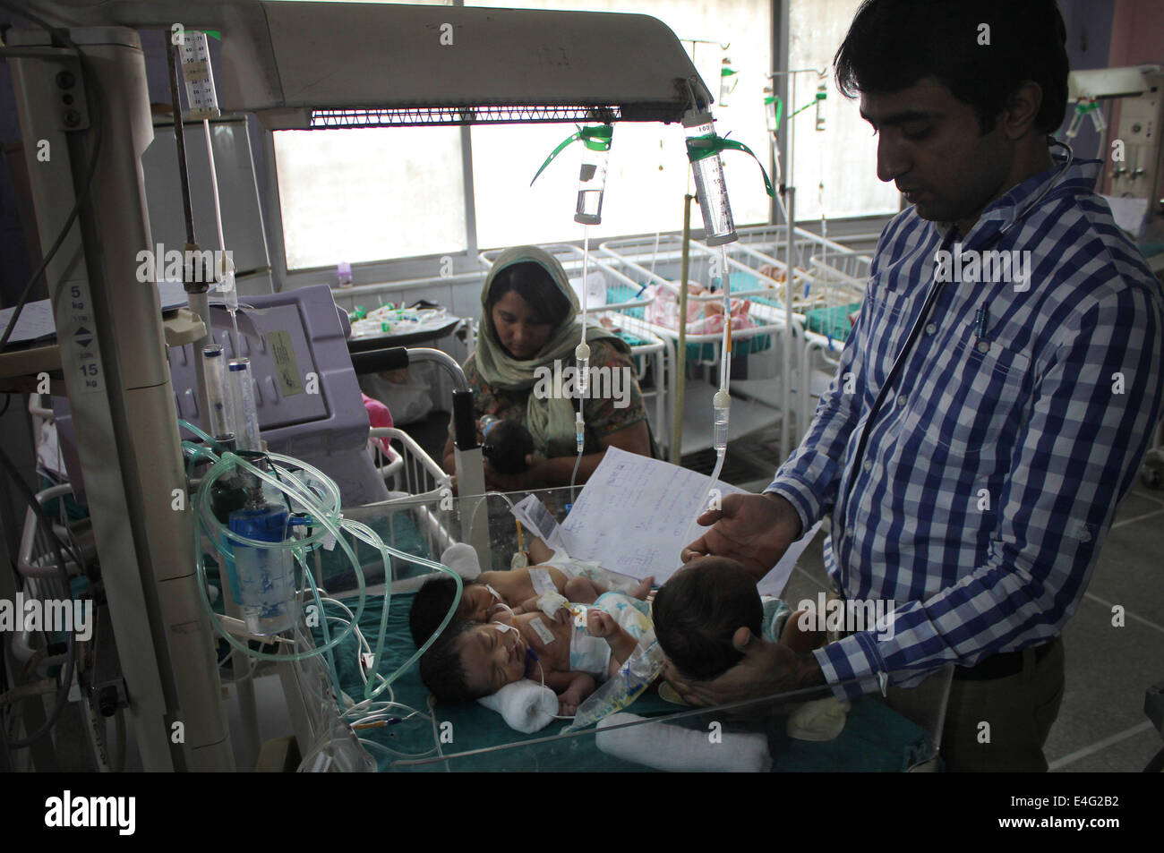 Lahore, Pakistan. 10th July, 2014. Pakistani new born babies being ...