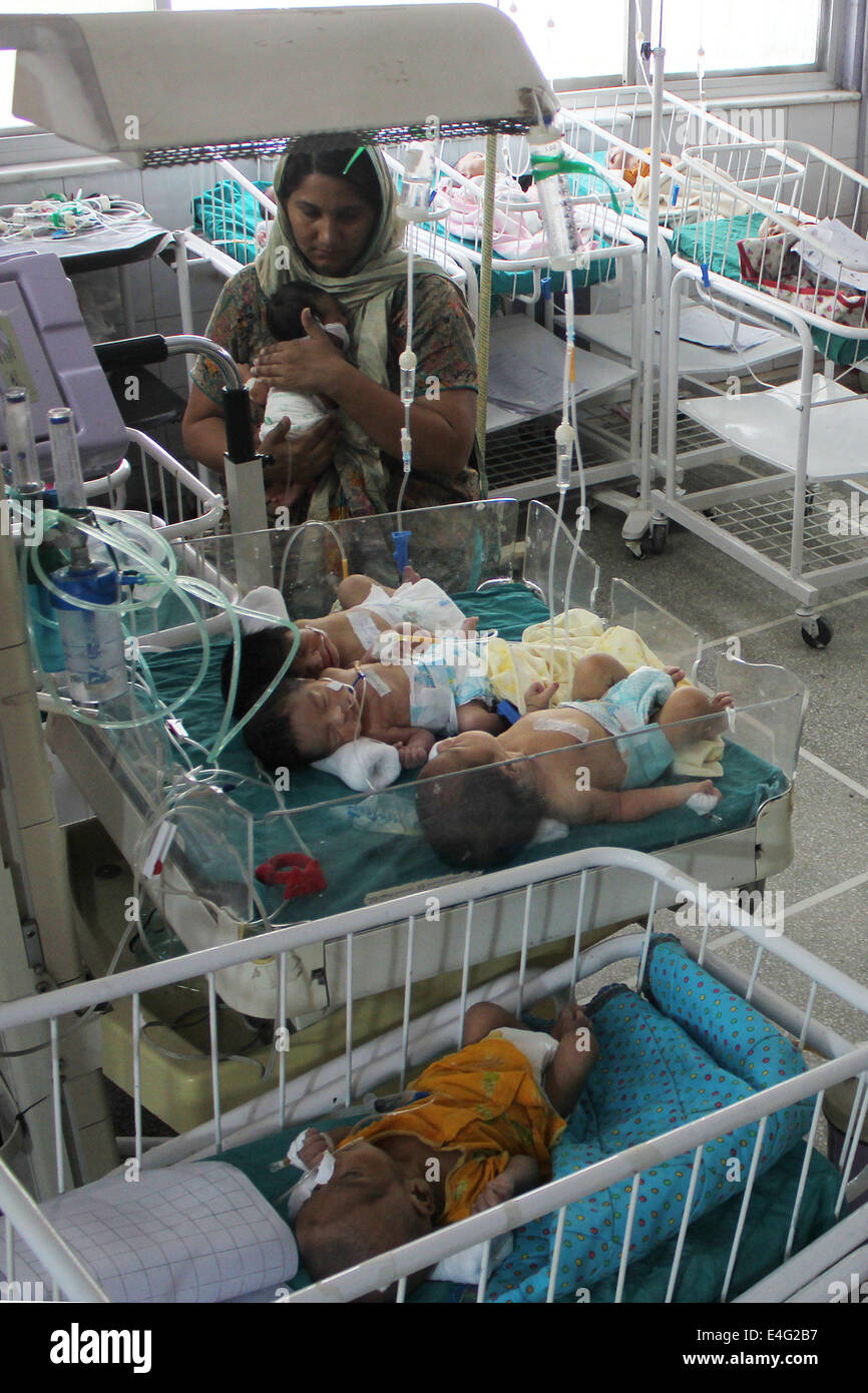 Lahore, Pakistan. 10th July, 2014. Pakistani new born babies being ...