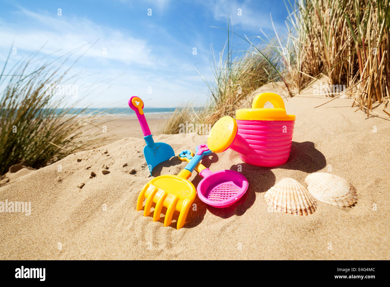 Toy sand rake hi-res stock photography and images - Alamy
