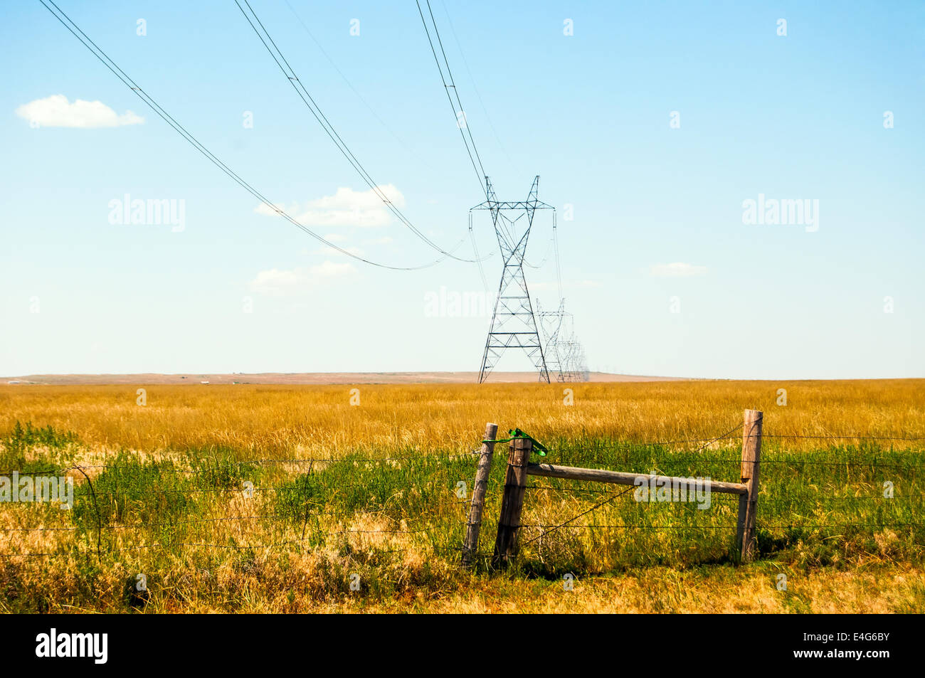 High voltage power lines crossing the open prairie in north central ...