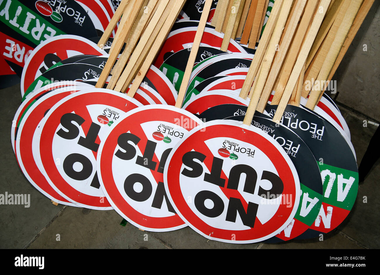 No Cuts placards are pictured on a rally against the cuts in London on ...