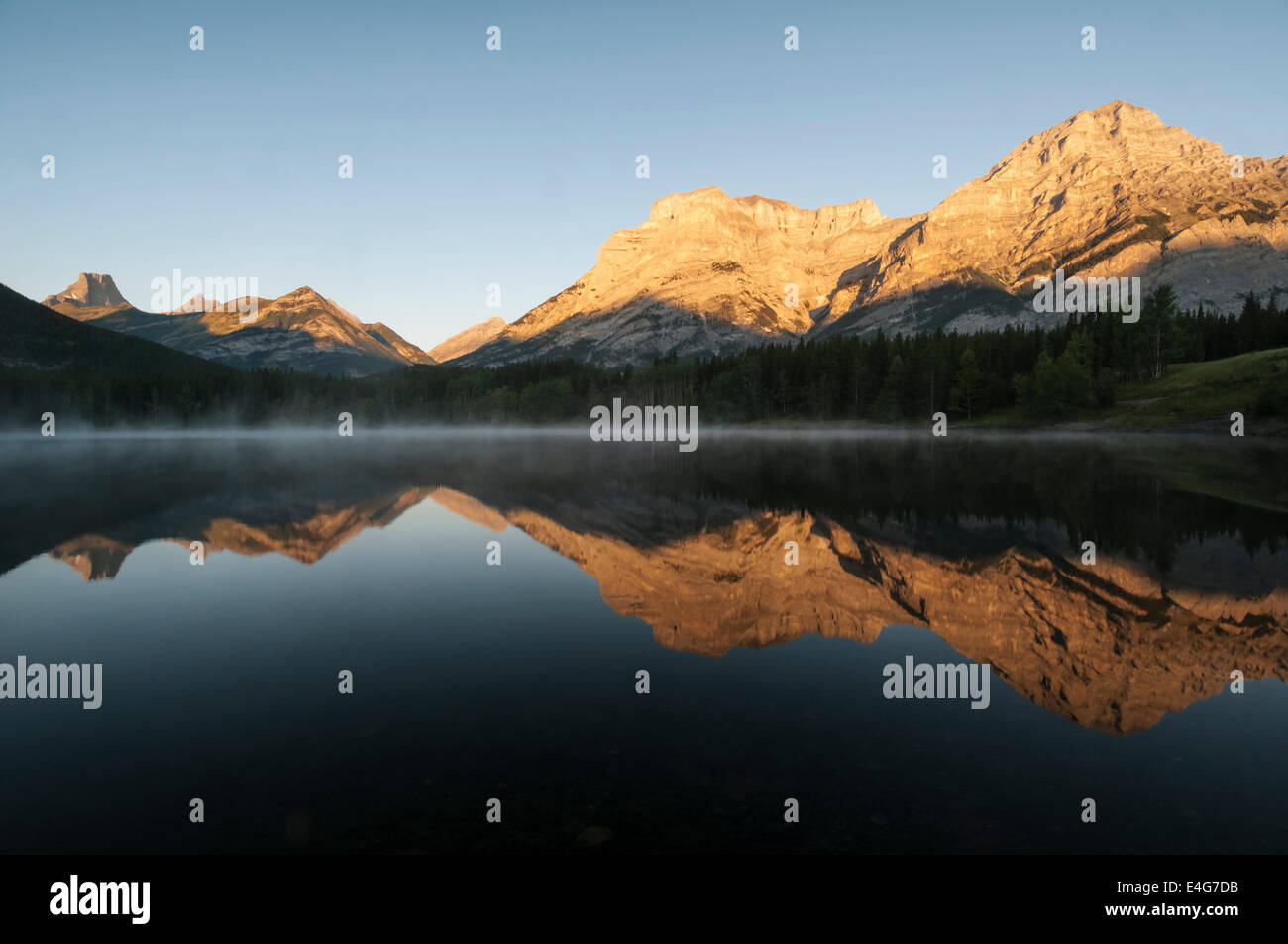 Sunrise over Fortress Mountain and Mount Kidd, Wedge Pond, Spray Valley ...