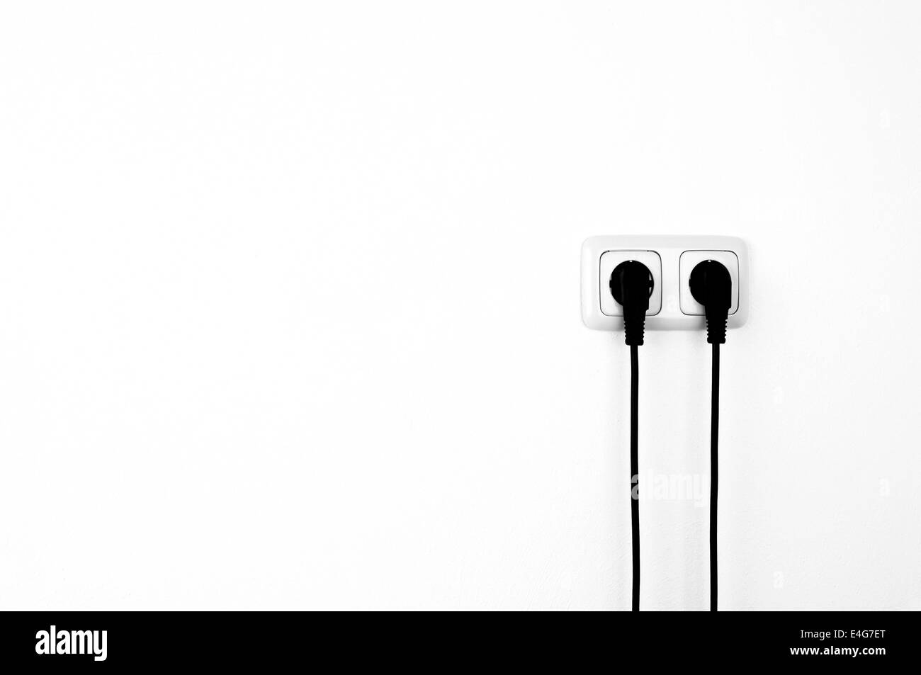 Two white electric power Black and White Stock Photos & Images - Alamy