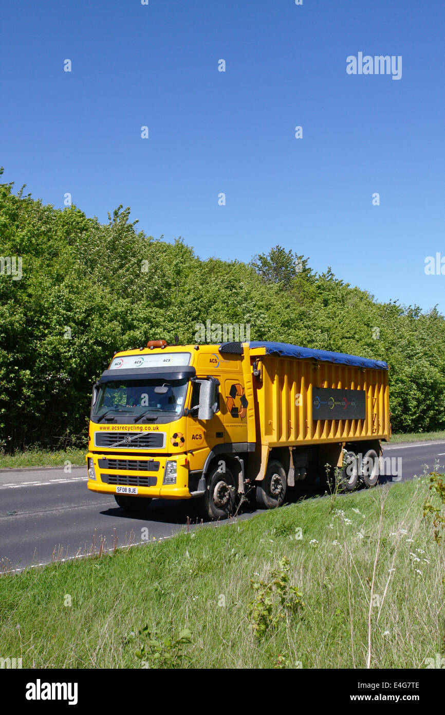 An ACS Recycling tipper truck traveling along the A28 single ...