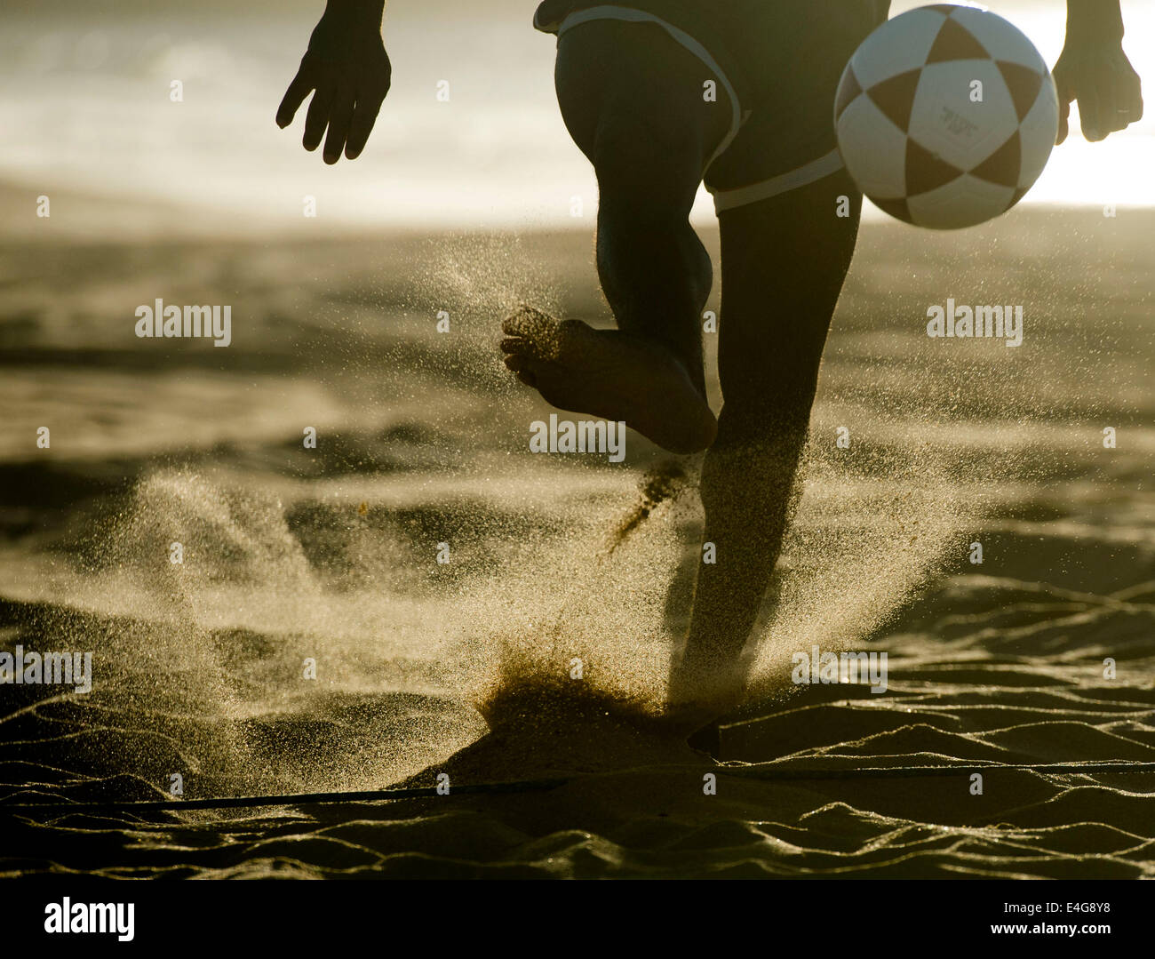 Salvador, Brazil. 4th July, 2014. A man plays foot volleyball in the ...