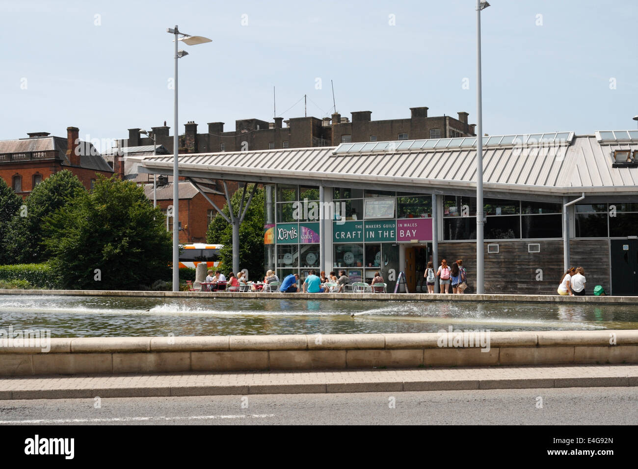 People sitting outside a cafe in Cardiff Bay Wales UK, Craft in the Bay ...