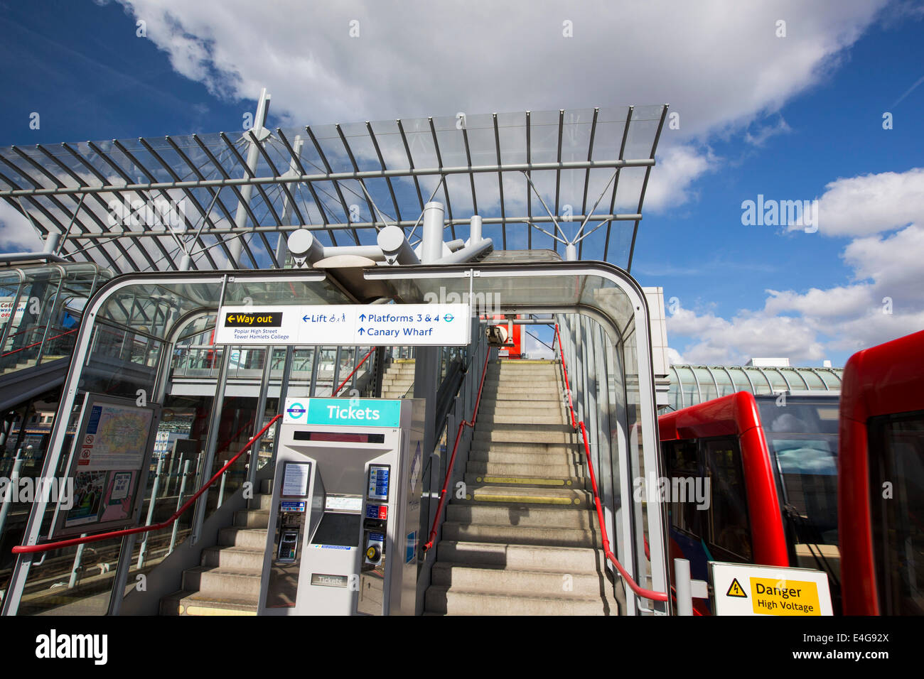 A Docklands Light Railway train (DLR) at a station near Canary wharf ...