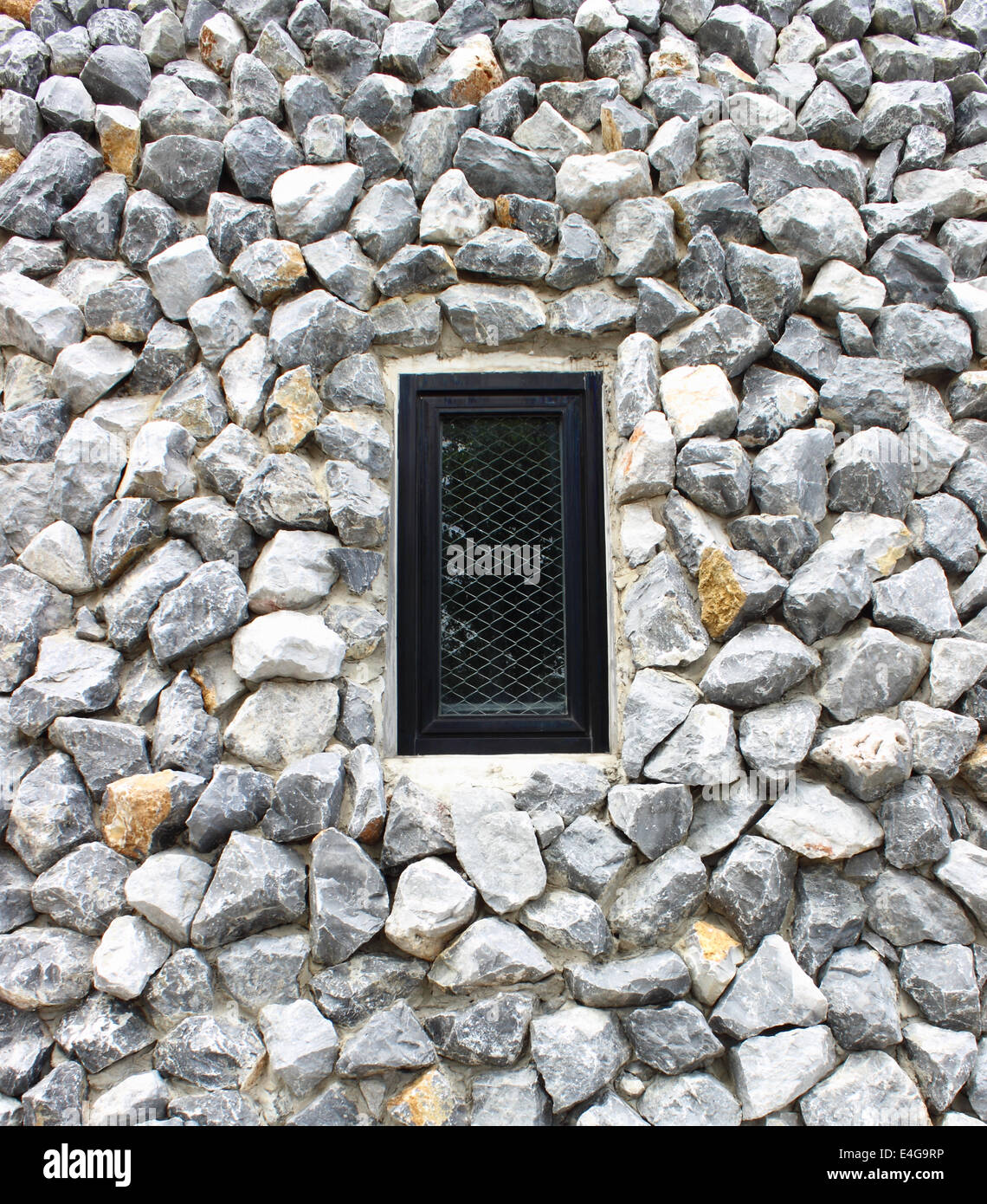 window with stone wall in background Stock Photo - Alamy