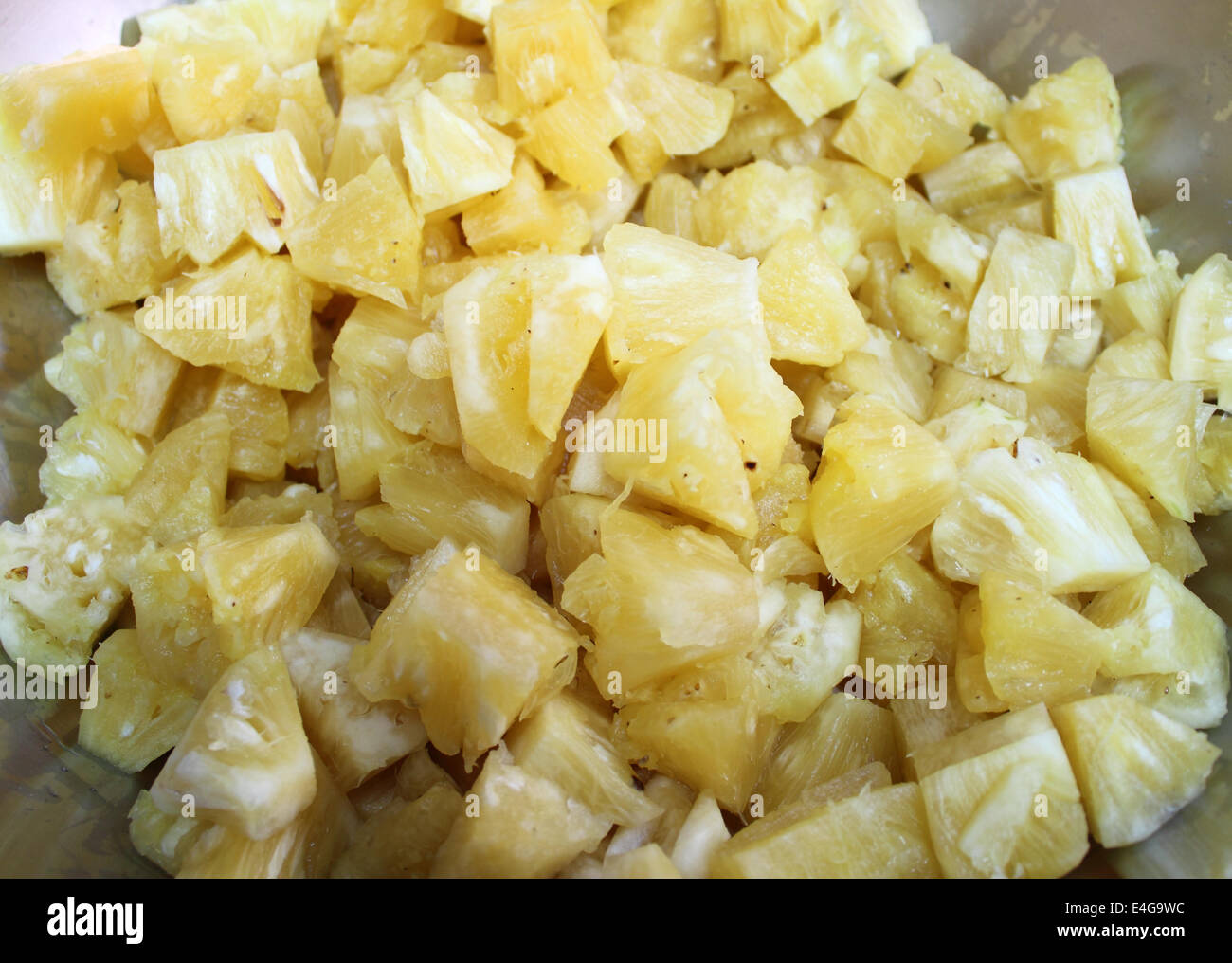 Pineapple chunks hi-res stock photography and images - Alamy