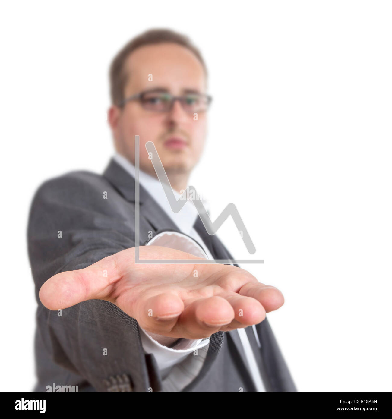 Business man reaches out his arm with a stock exchange graph going ...